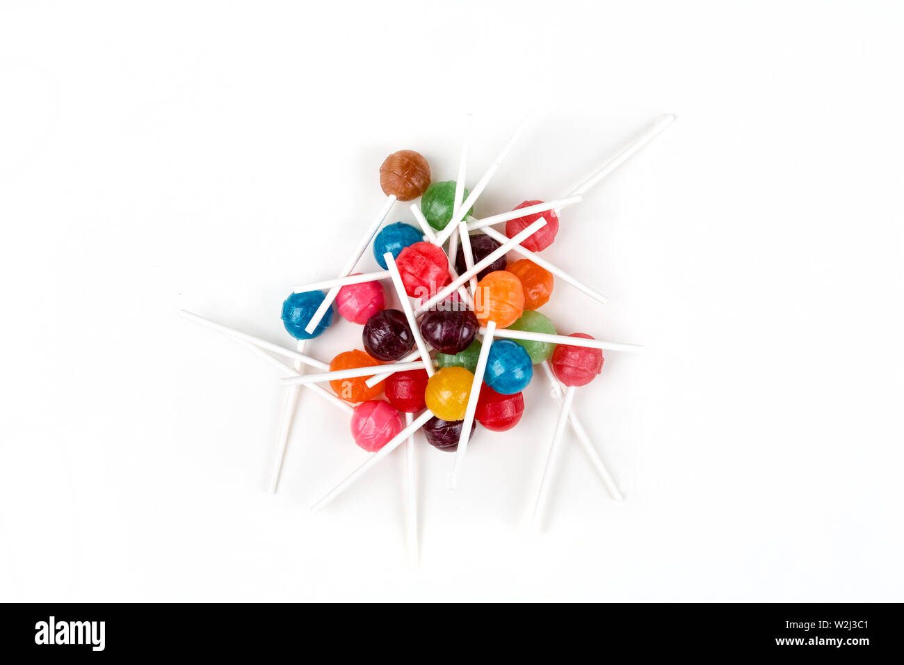 Pile of multicolored candy suckers Stock Photo - Alamy