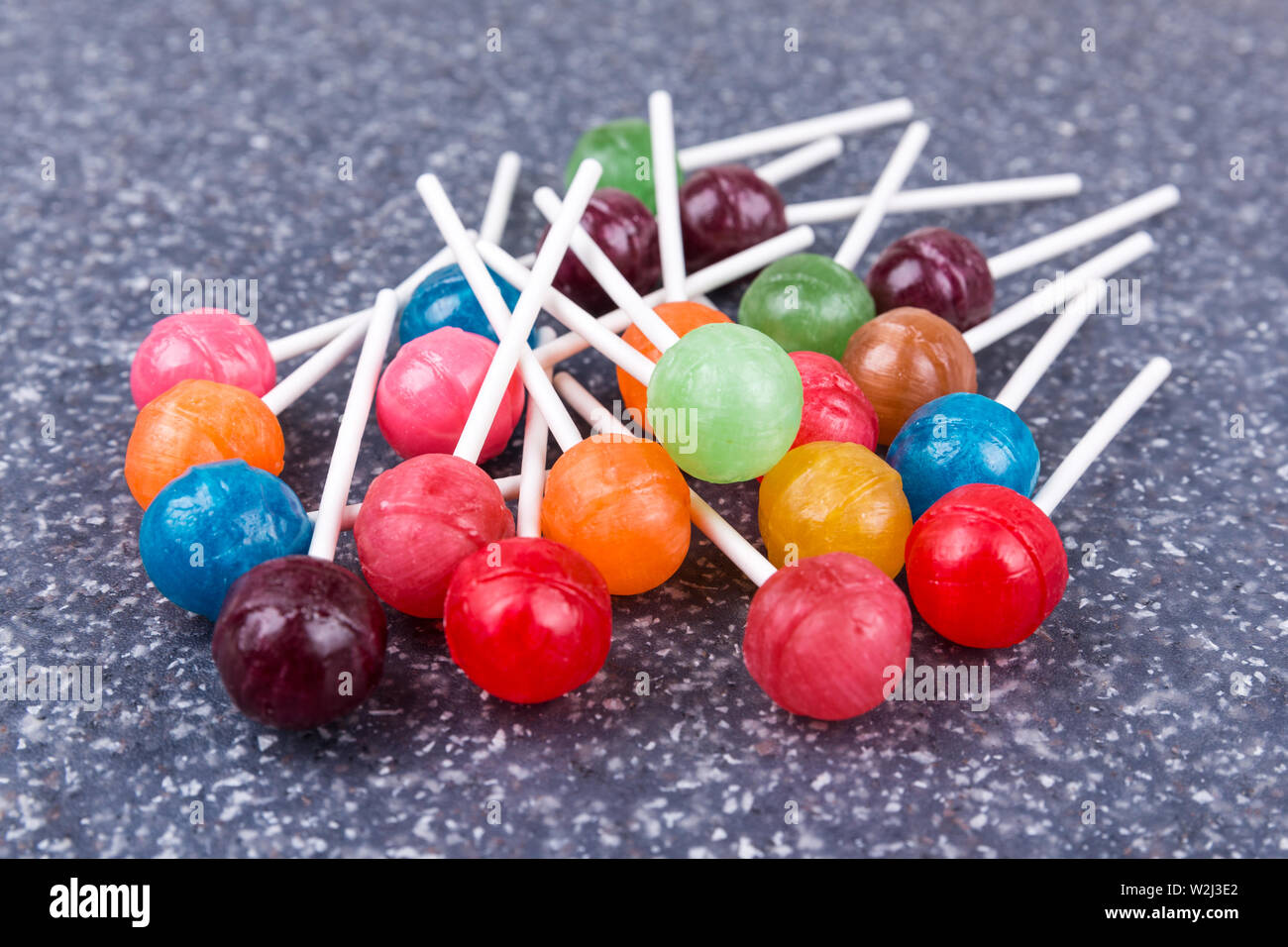 Pile of multicolored candy suckers Stock Photo - Alamy