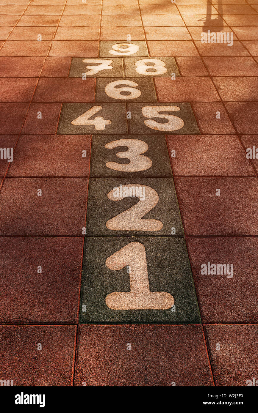 Hopscotch game on outdoor playground for children in diminishing ...
