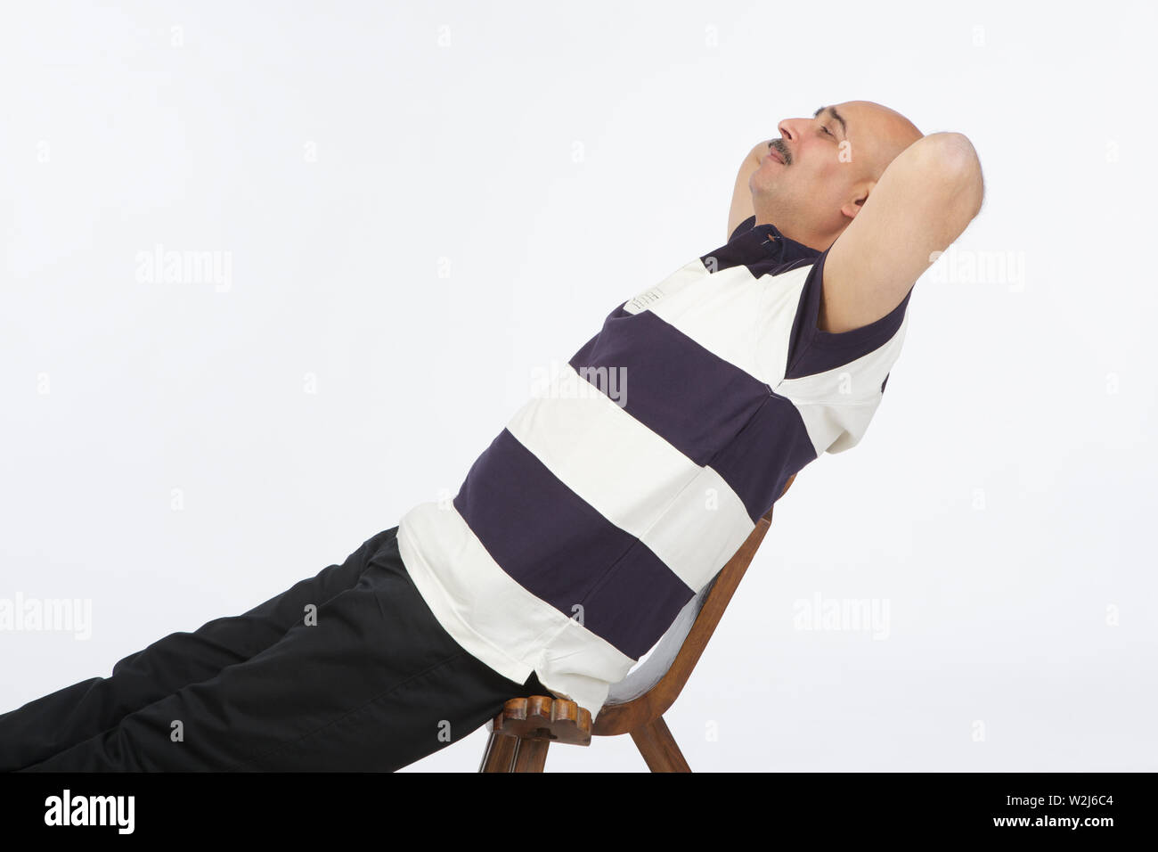 Old man sleeping chair hi-res stock photography and images - Alamy