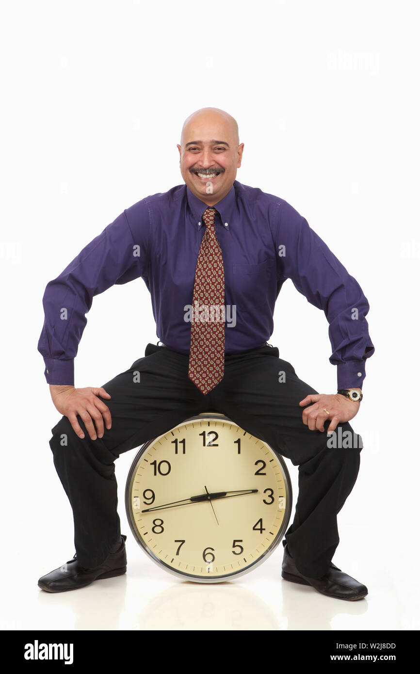 Sitting on a clock face hi-res stock photography and images - Alamy