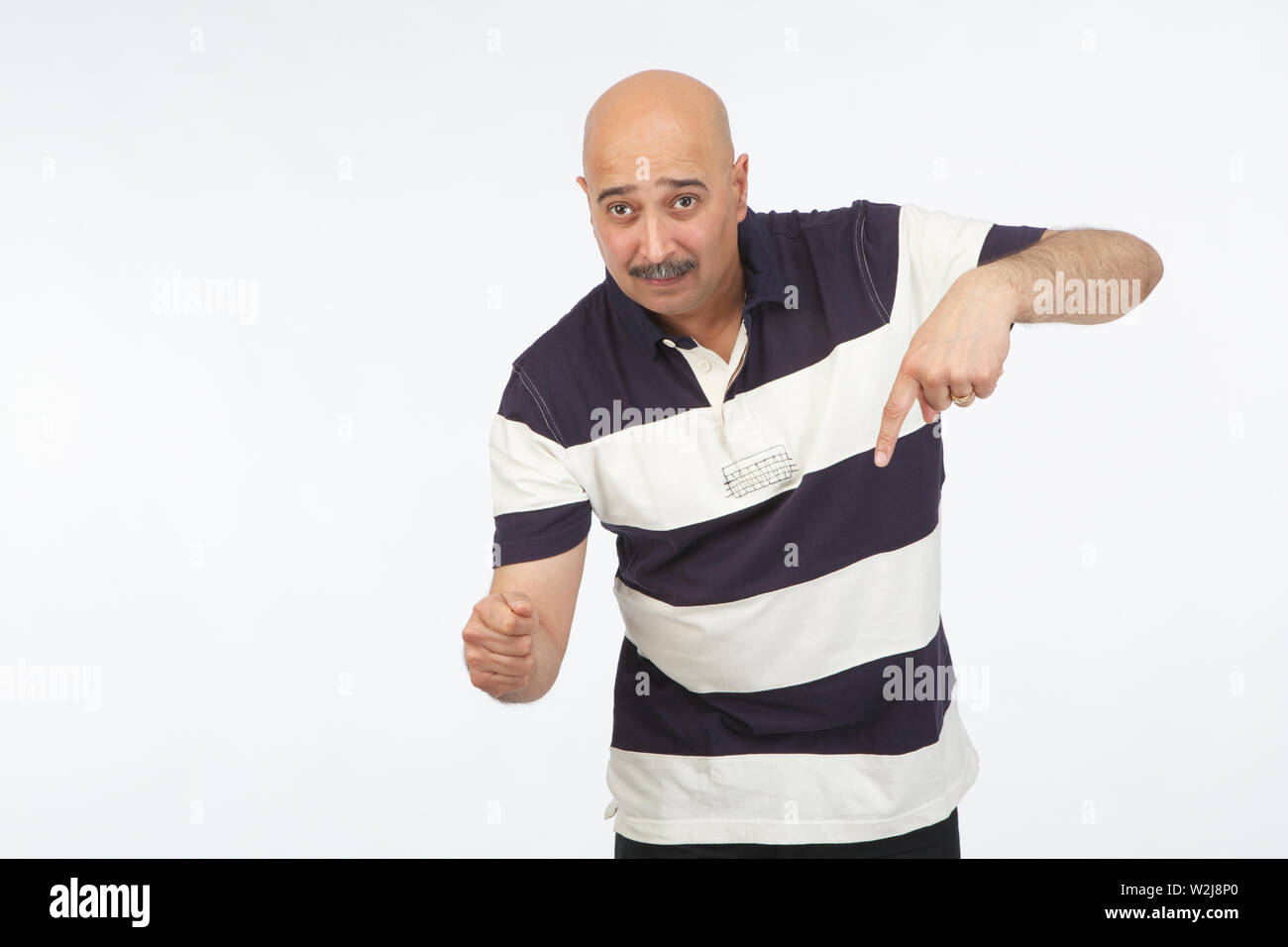Portrait of a man pointing Stock Photo - Alamy
