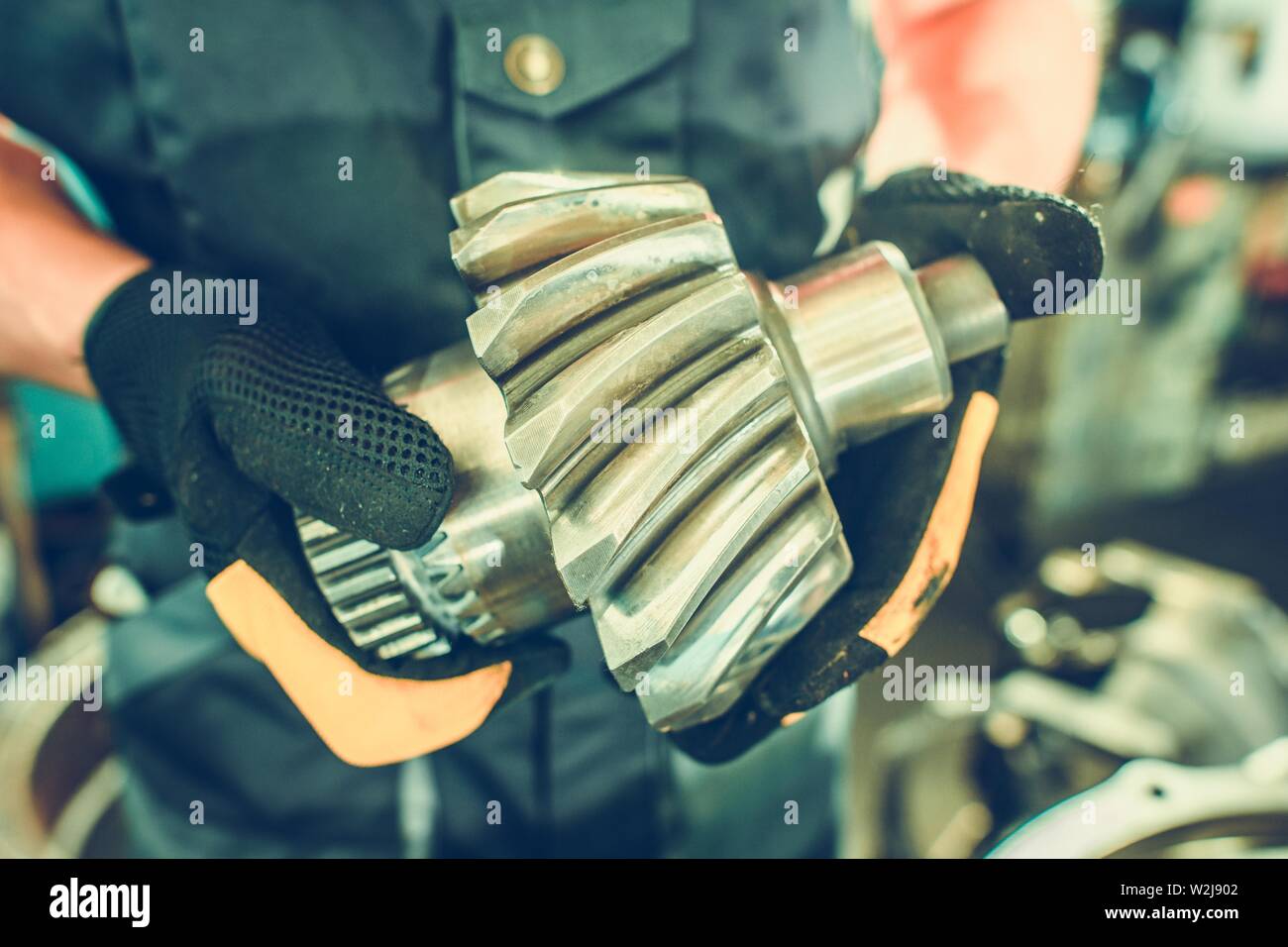 Machine Spare Part in Mechanic Hands. Closeup Photo. Repairing Heavy ...