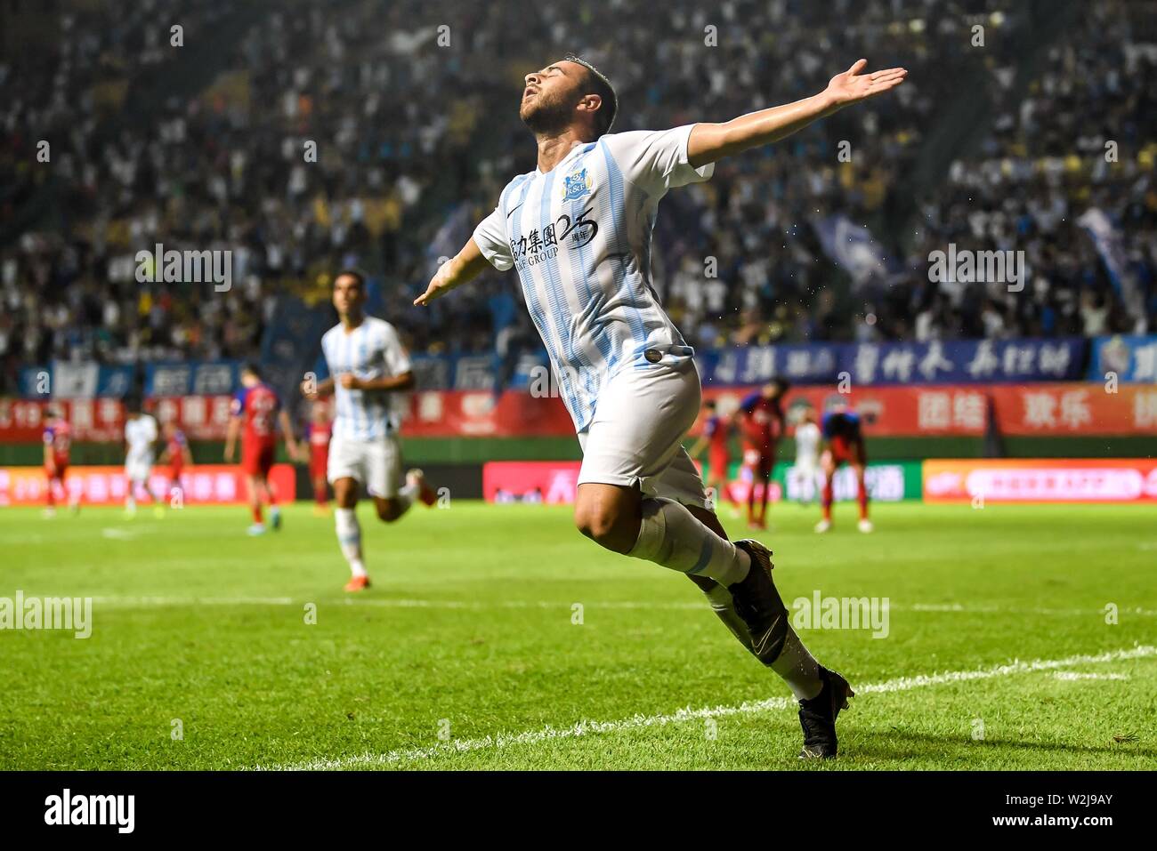 Israeli-Arab football player Dia Saba of Guangzhou R&F celebrates after ...