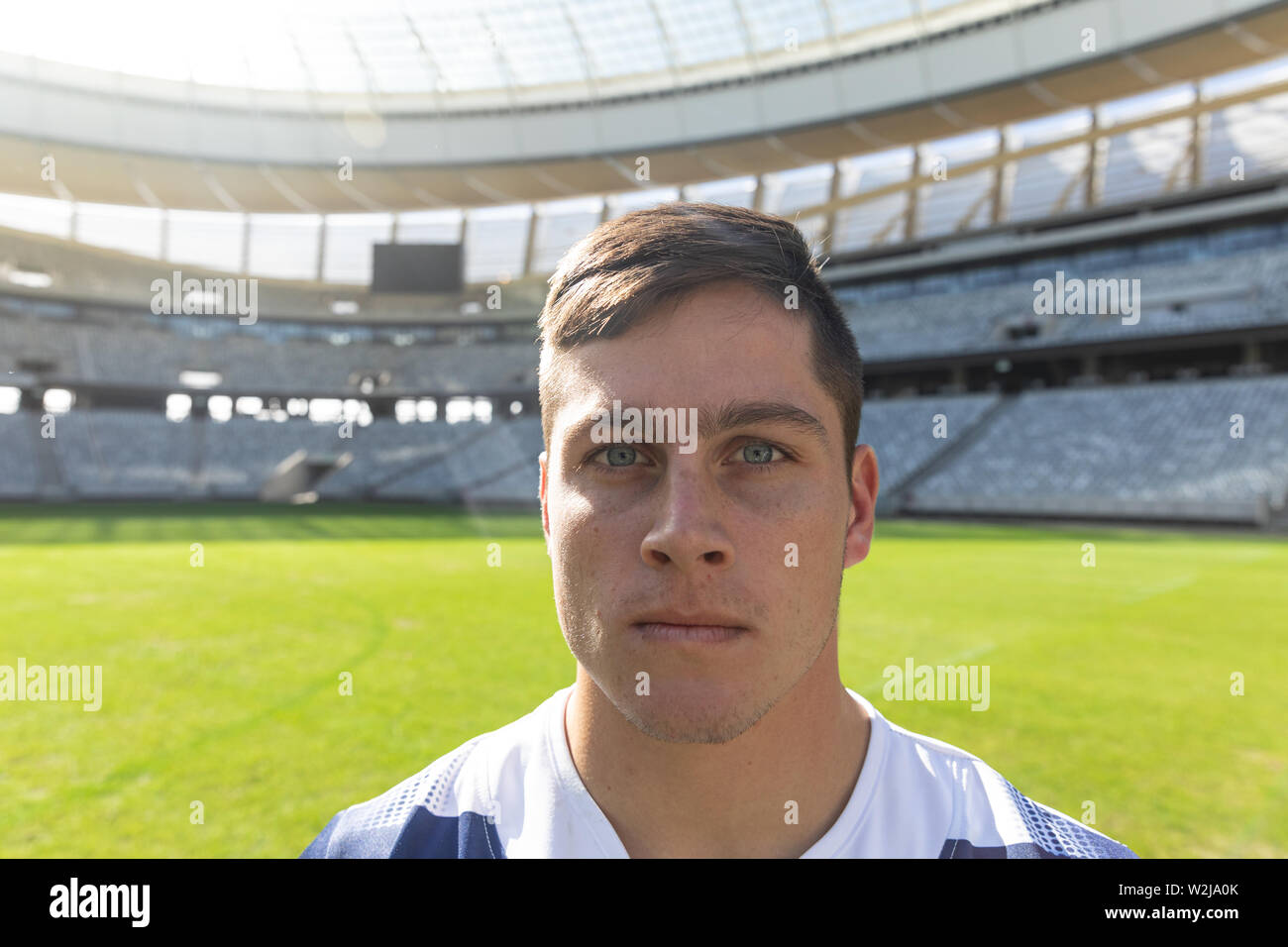 Male rugby player standing in stadium Stock Photo - Alamy