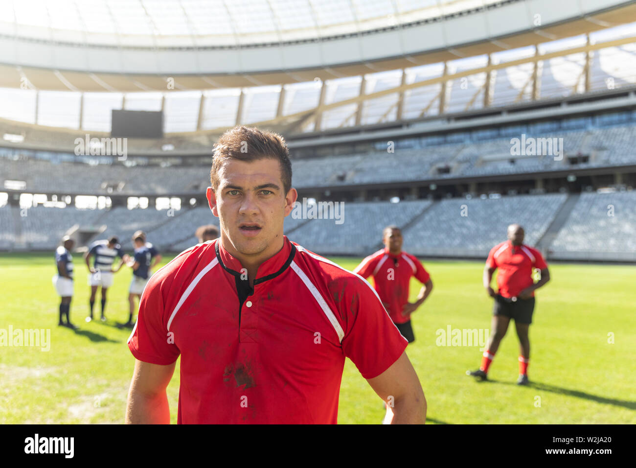 Male rugby player standing in stadium Stock Photo - Alamy