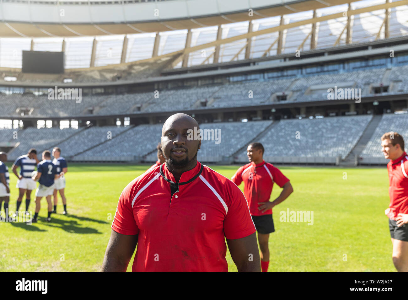 Male rugby player standing in stadium Stock Photo - Alamy