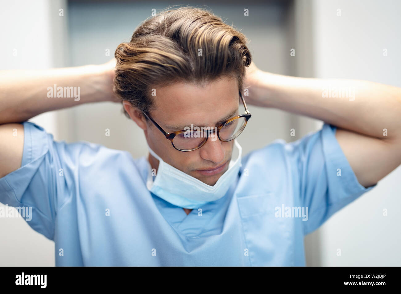 Removing surgical mask hi-res stock photography and images - Alamy