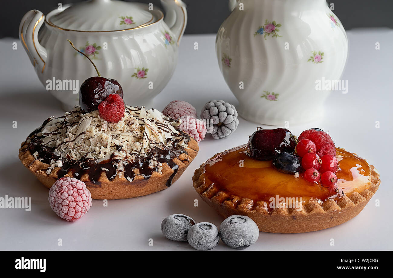 Biscuit, cream, chocolate and forest fruits cakes Stock Photo - Alamy