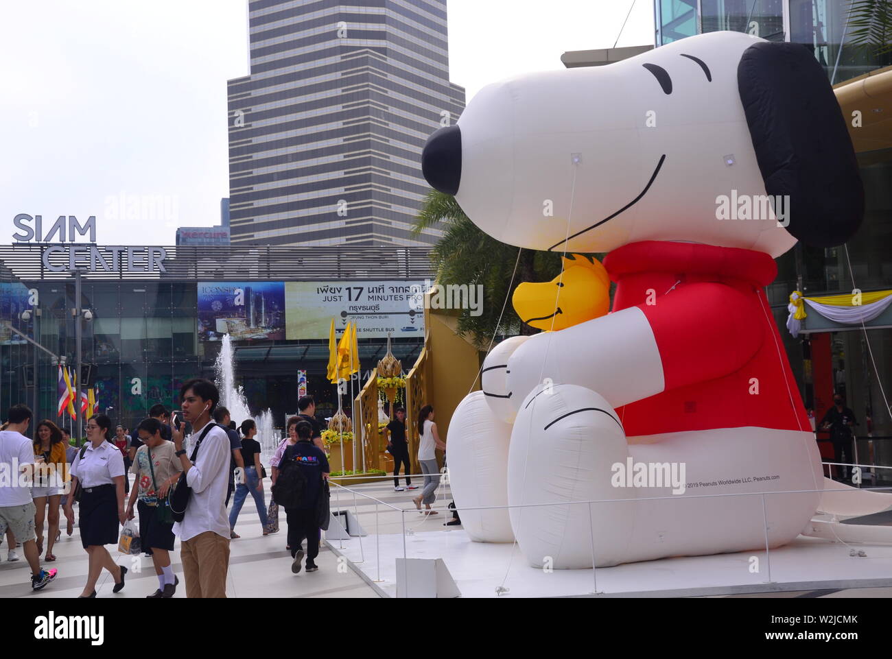 An inflated Snoopy at the entrance of the Siam Paragon shopping centre ...