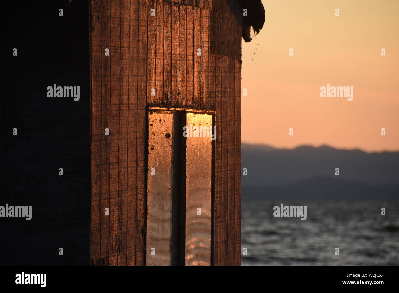 Old boat house on dock in Clear Lake California which is falling apart ...