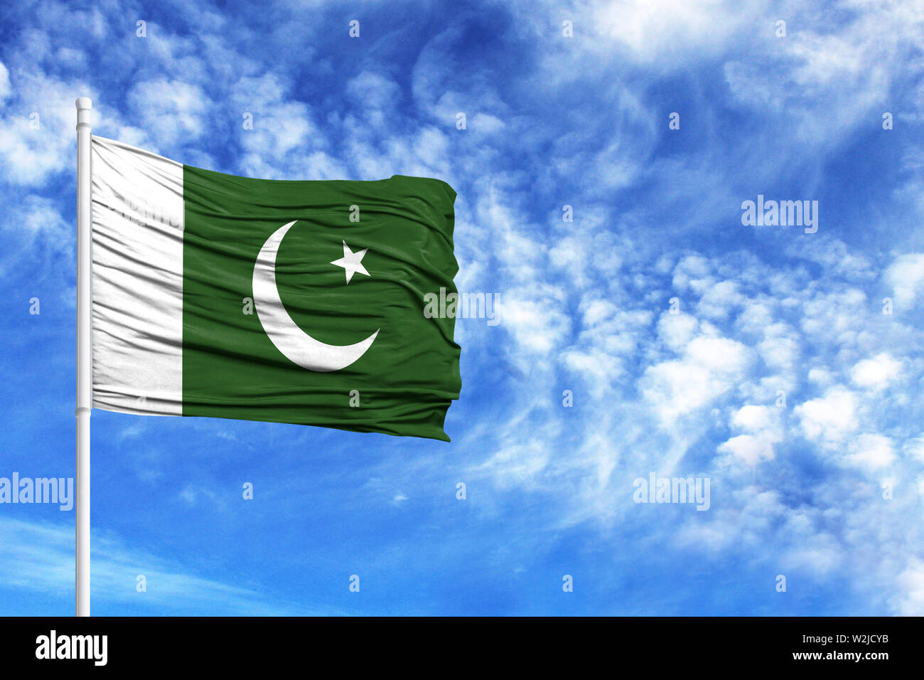 Pakistan flag on flag pole hi-res stock photography and images - Alamy