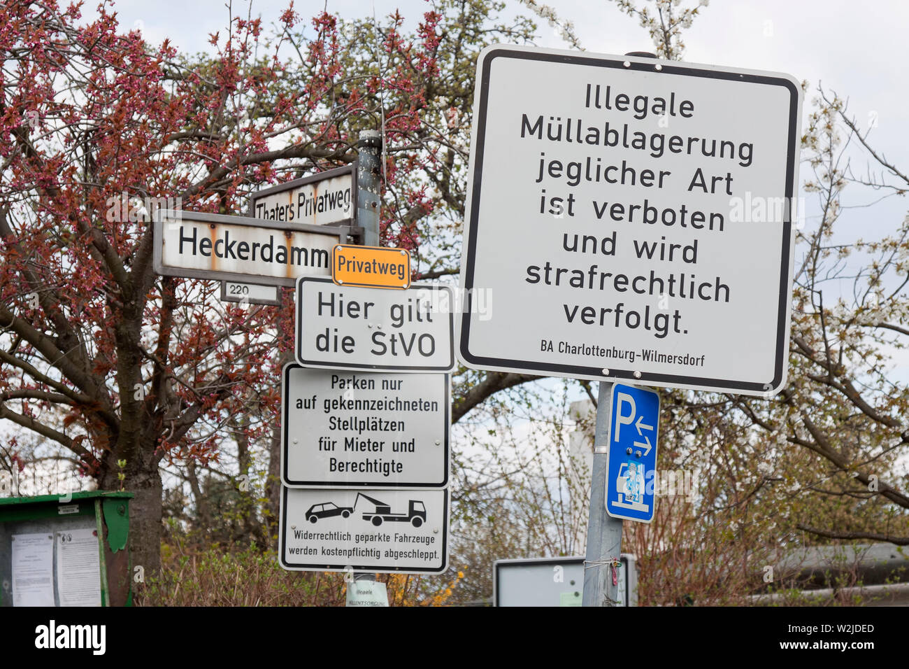 Many street signs in Berlin Stock Photo - Alamy