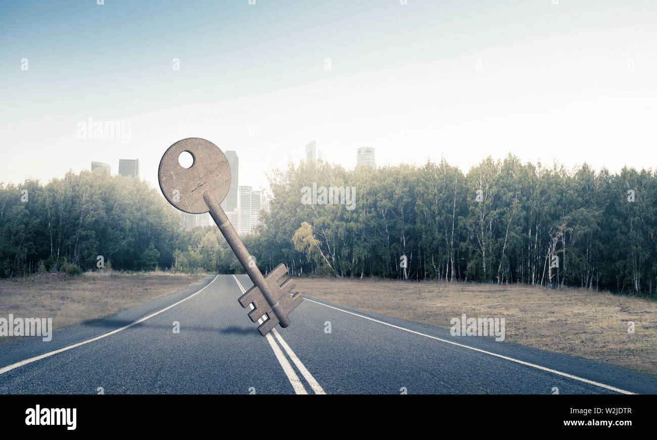 Conceptual background image of concrete key sign on asphalt road Stock ...