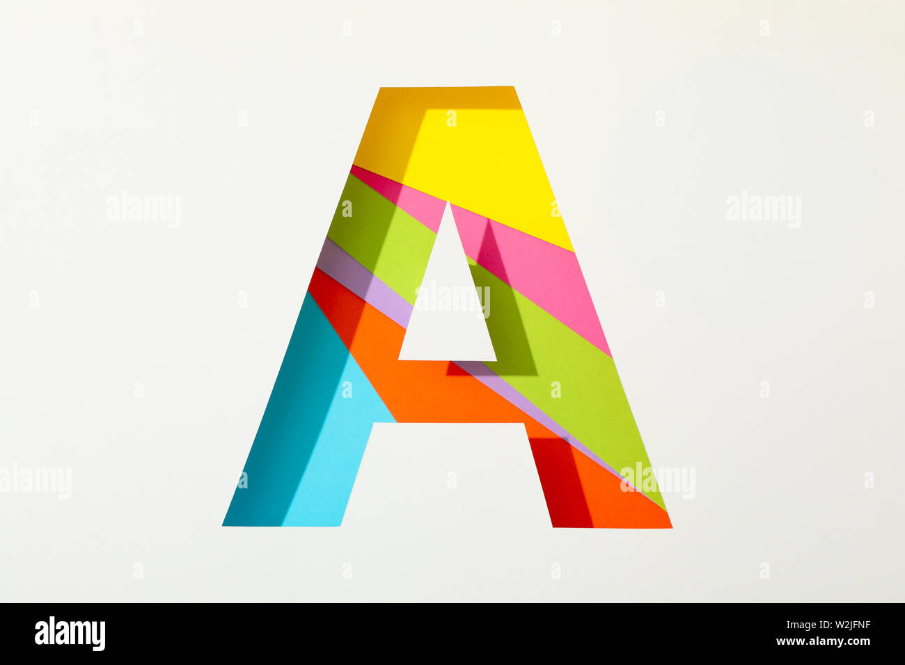 Multicolor letter A on white background, space for text Stock Photo - Alamy