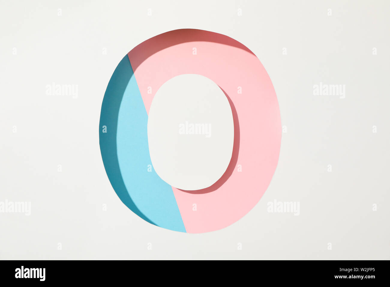Two color letter O on white background, space for text Stock Photo - Alamy