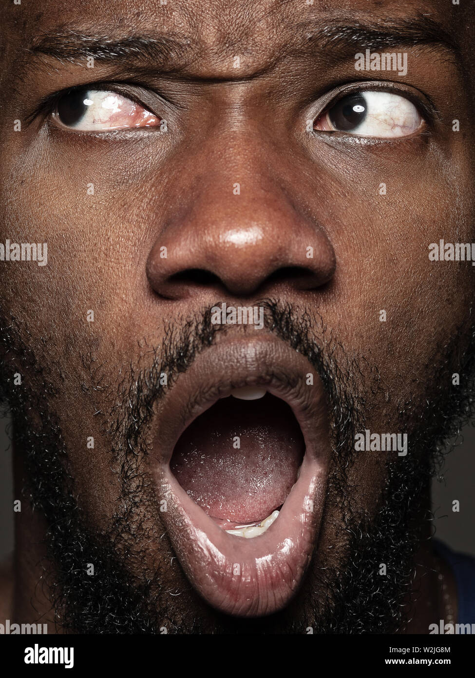 Close up african man shocked hi-res stock photography and images - Alamy