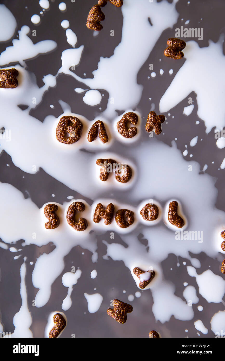 Chocolate cornflakes in the shape of letters of the English alphabet ...
