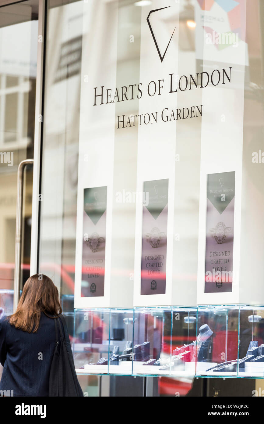 A window shopper in Hatton Garden Central London Stock Photo - Alamy