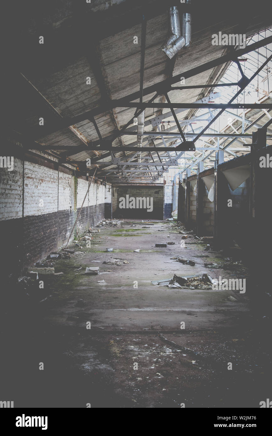 Inside of an old derelict factory Stock Photo - Alamy
