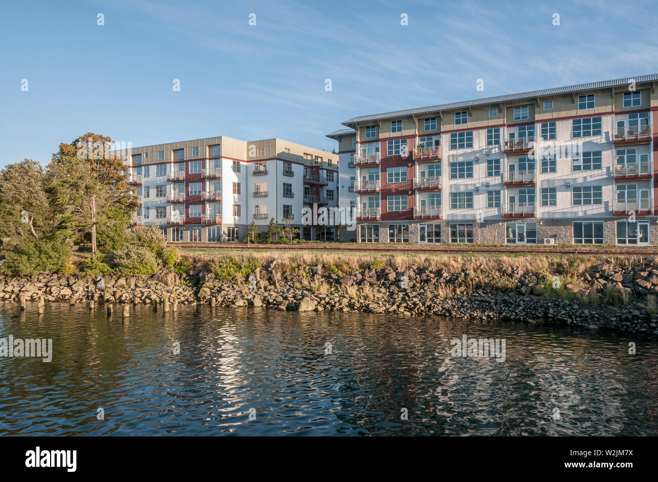 Condominium or Apartment multi-family building exterior reflected in ...