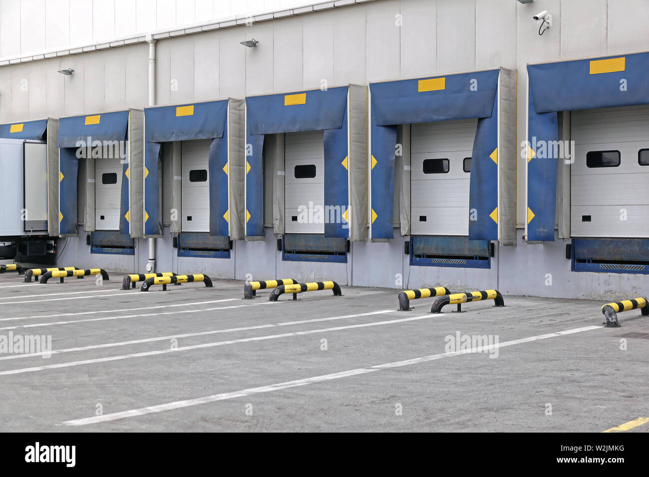 Loading Ramp Cargo Doors at Distribution Center Warehouse Stock Photo ... Loading Ramp Cargo Doors at Distribution Center Warehouse Stock Photo ...