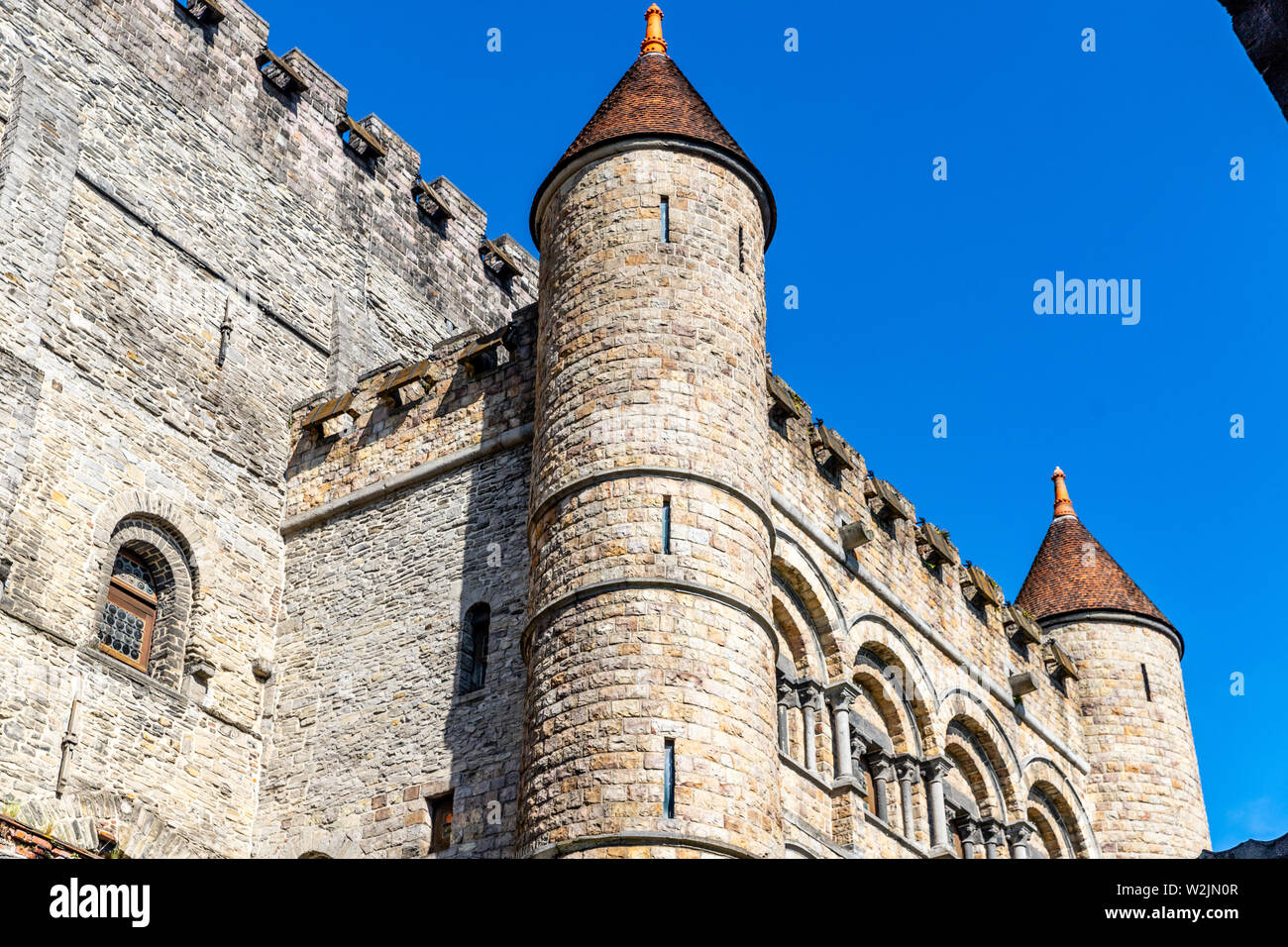 10th-century medieval moated castle Gravensteen view with towers and ...