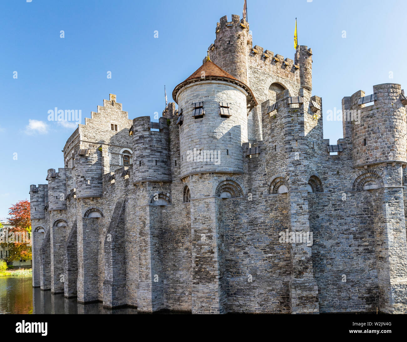 10th-century medieval moated castle Gravensteen view with towers and ...