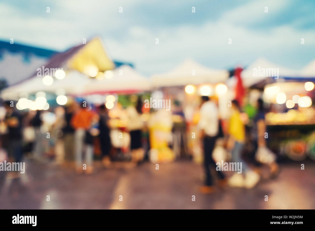 Abstract blur background in night market at shopping mall for ...