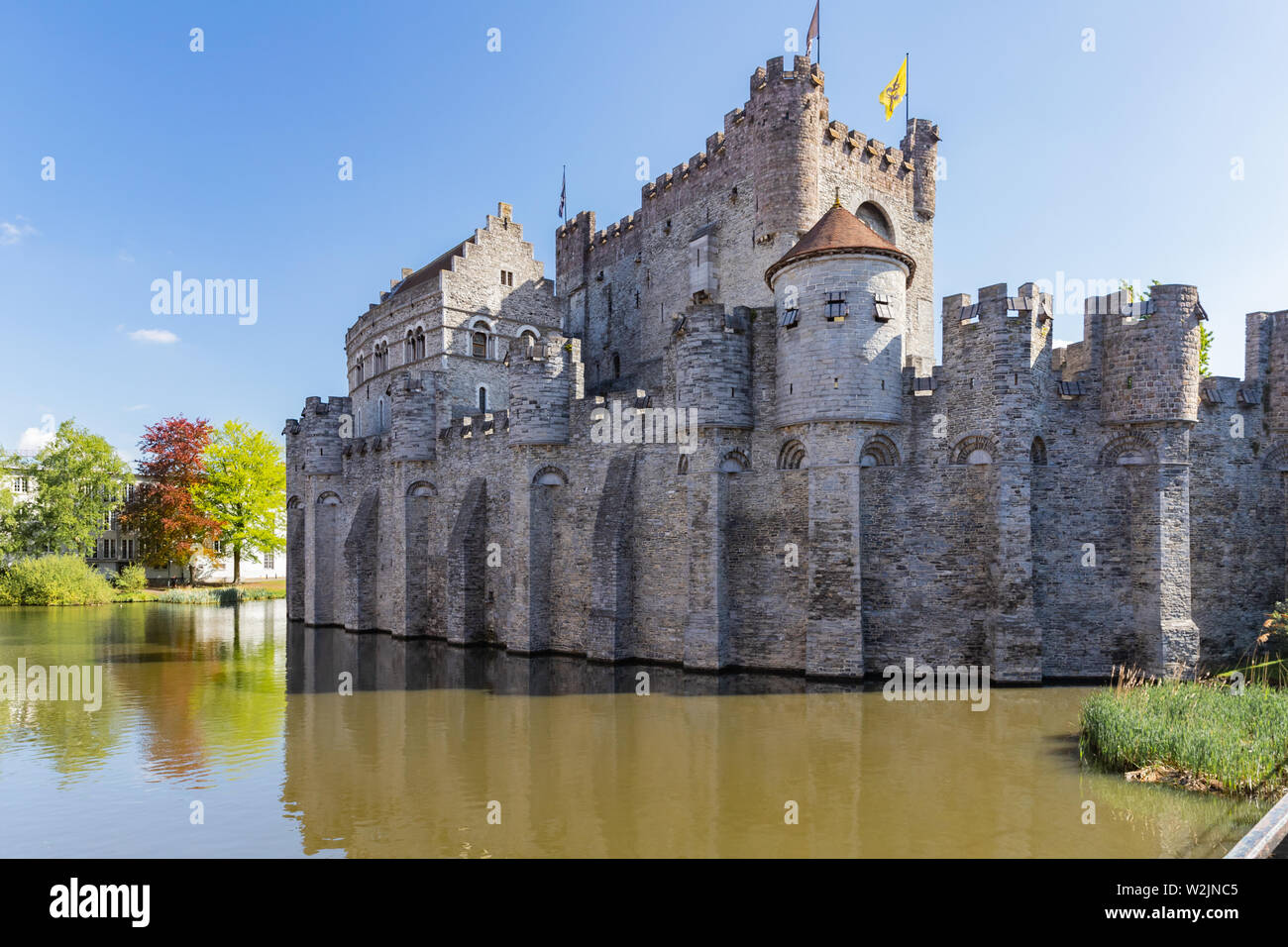 10th-century medieval moated castle Gravensteen view with towers and ...