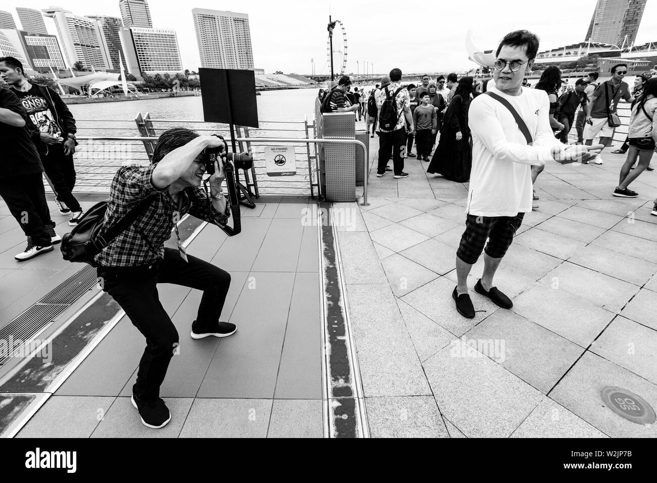 Tourists pose for photos Black and White Stock Photos & Images - Alamy