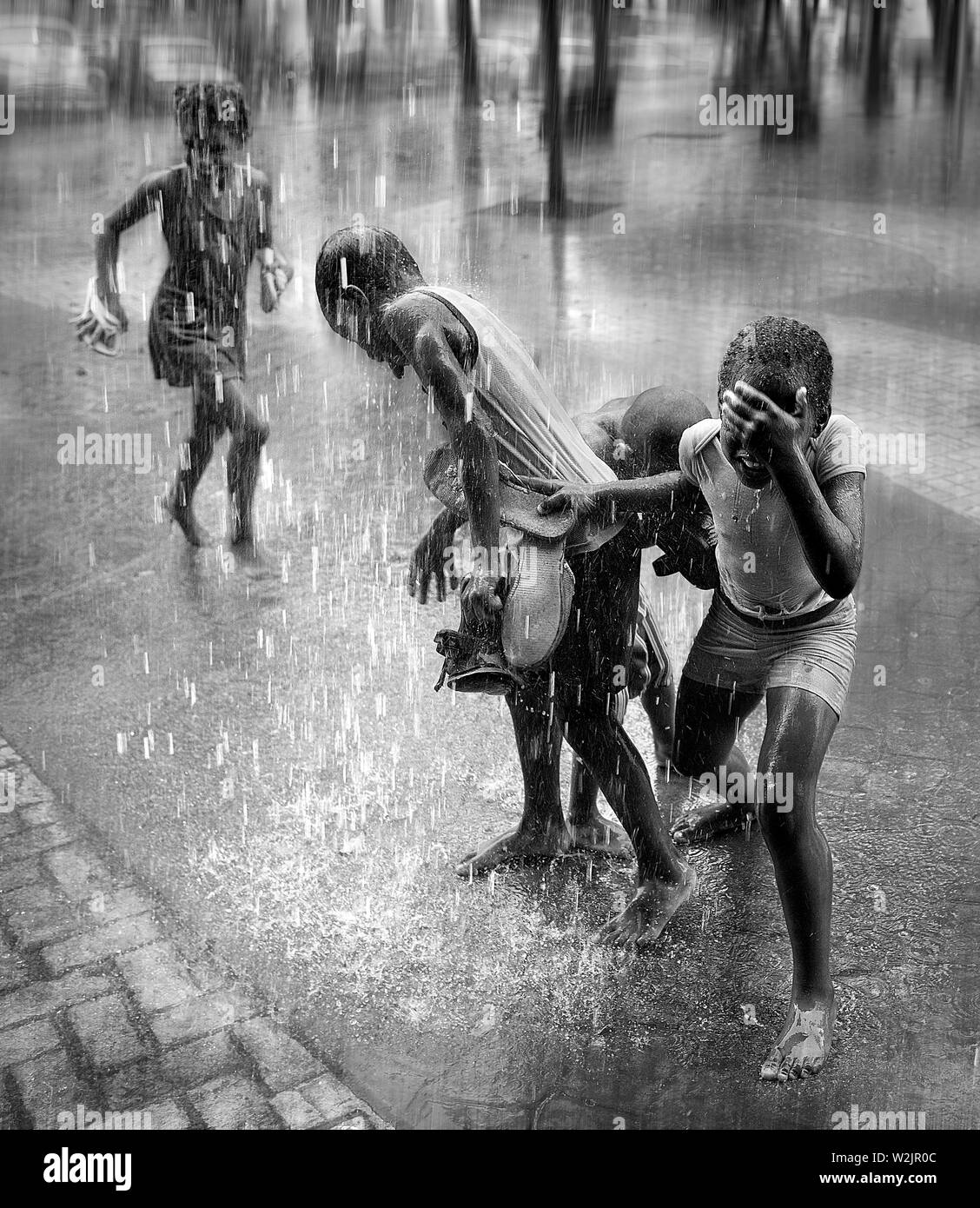 Black Kids Playing In The Rain