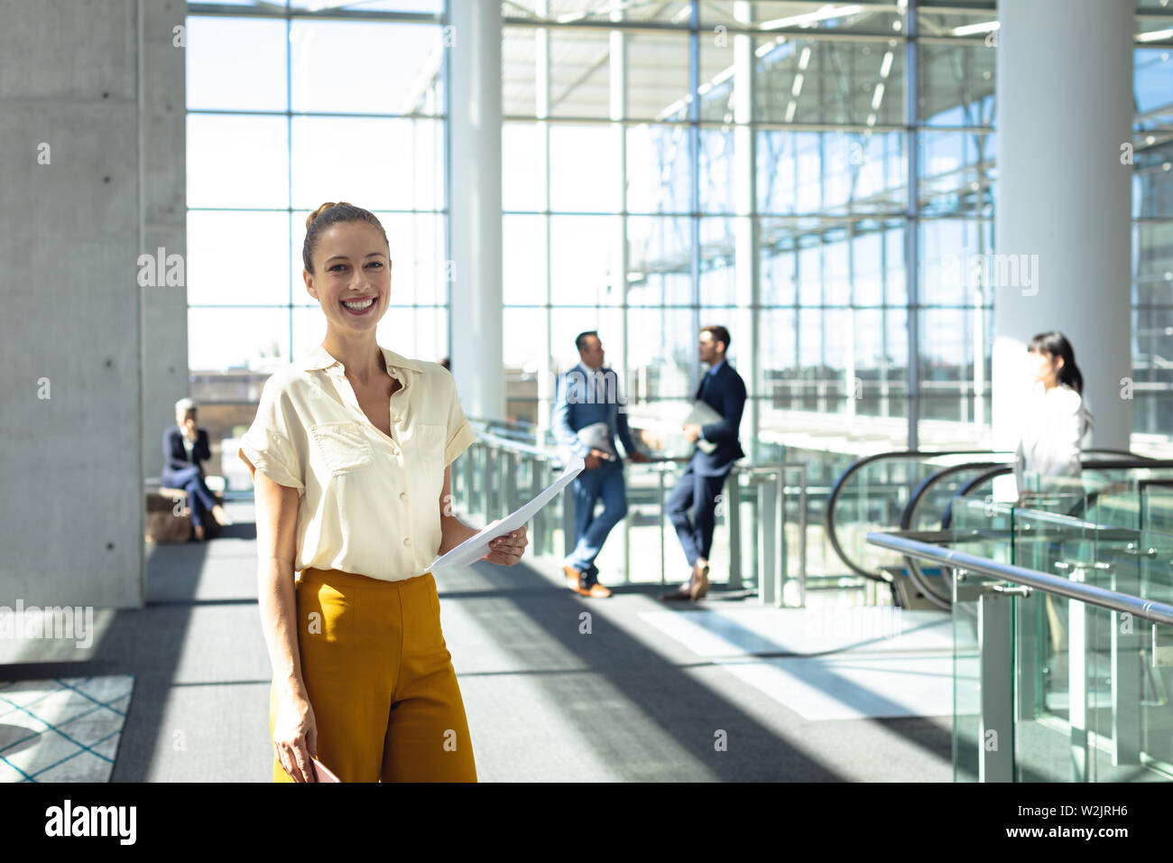 Female executive looking at camera hi-res stock photography and images ...