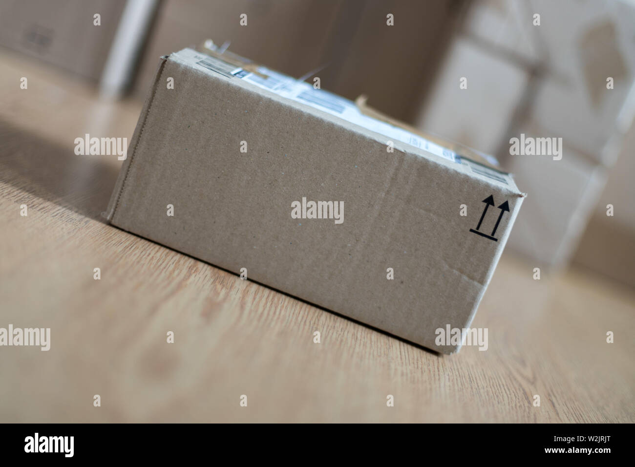 Cardboard box shipping concept: brown parcel Stock Photo - Alamy