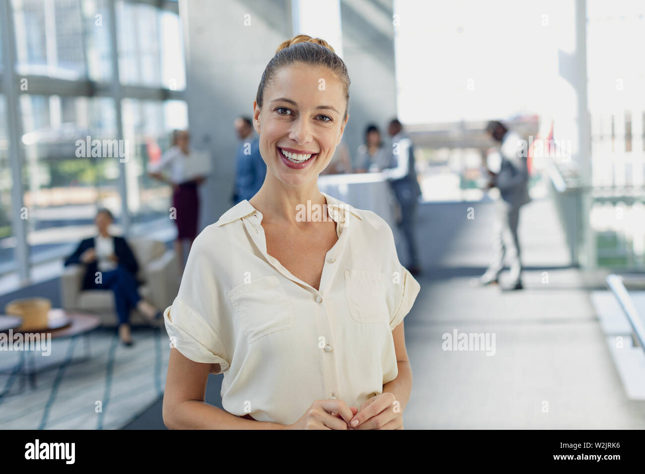 Female executive looking at camera hi-res stock photography and images ...