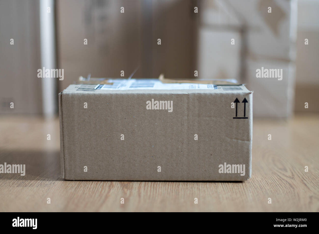 Cardboard box shipping concept: brown parcel Stock Photo - Alamy