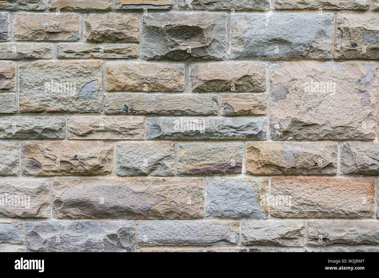 A wall built with stone blocks Stock Photo - Alamy