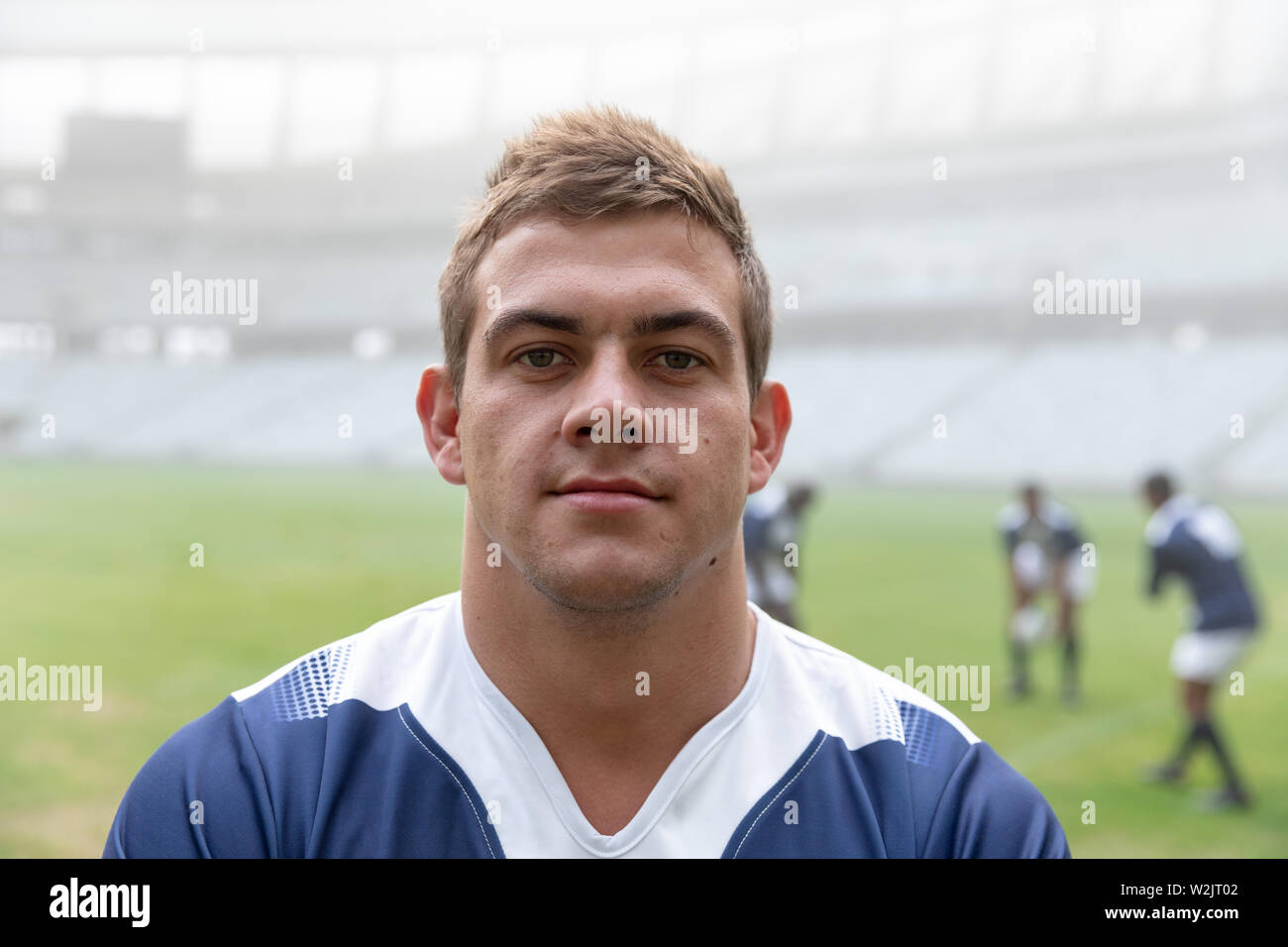 Caucasian Male rugby player standing in stadium Stock Photo - Alamy