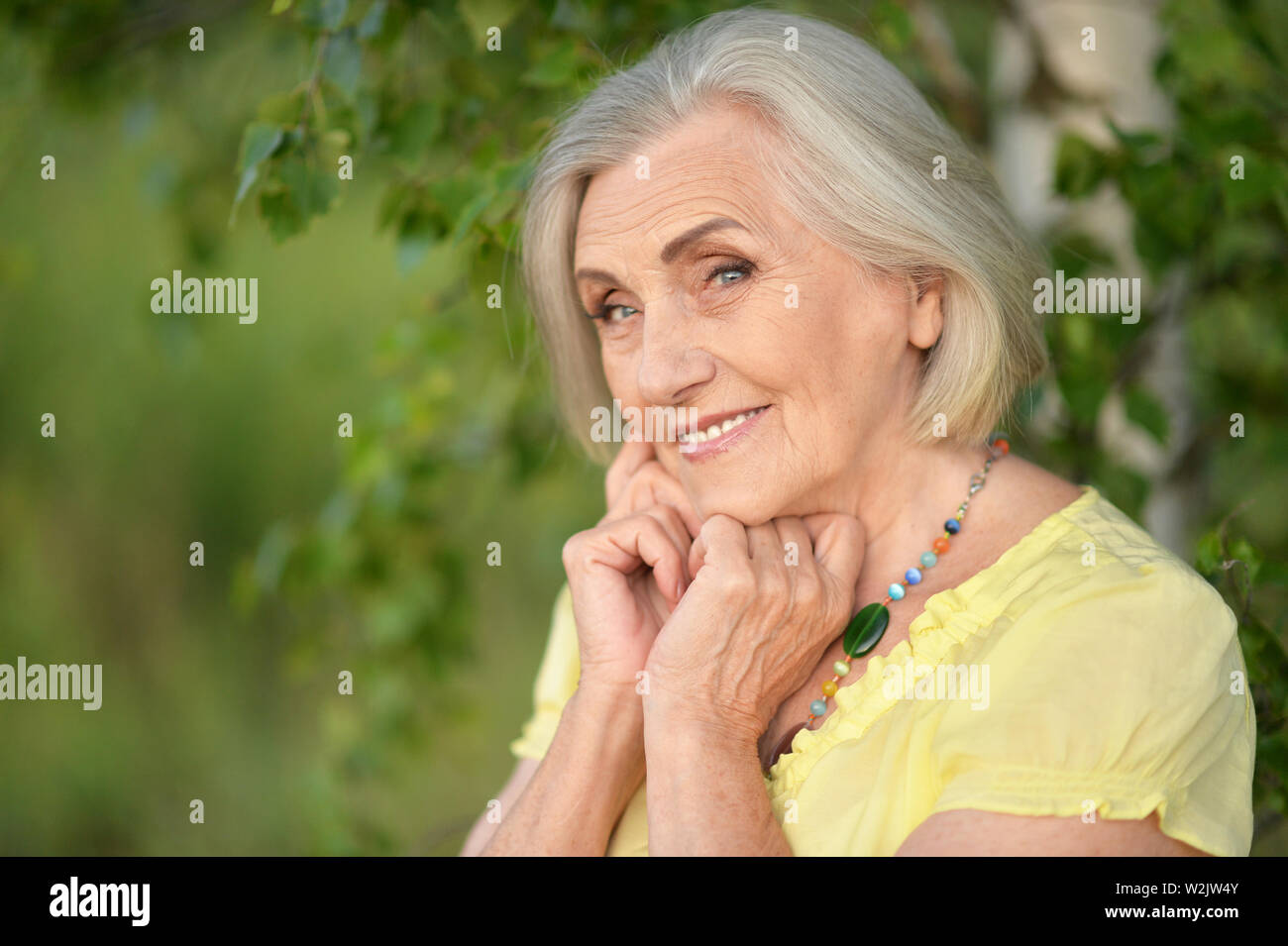 Portrait of happy smiling senior beautiful woman Stock Photo - Alamy
