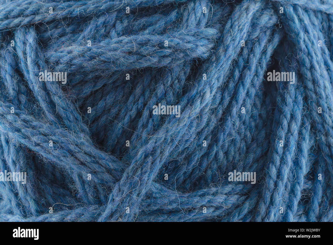 Cozy photo background of large wool yarn Stock Photo - Alamy
