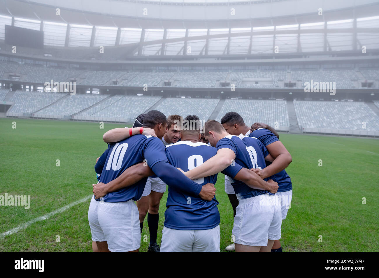 Forming huddles hi-res stock photography and images - Alamy