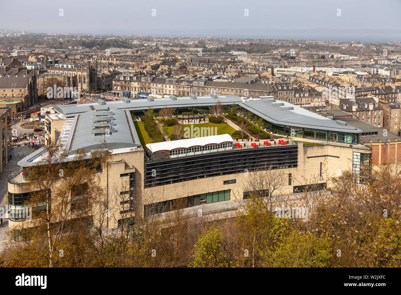 Elevated view of the rooftops of Edinburgh, Scotland: the roof garden ...