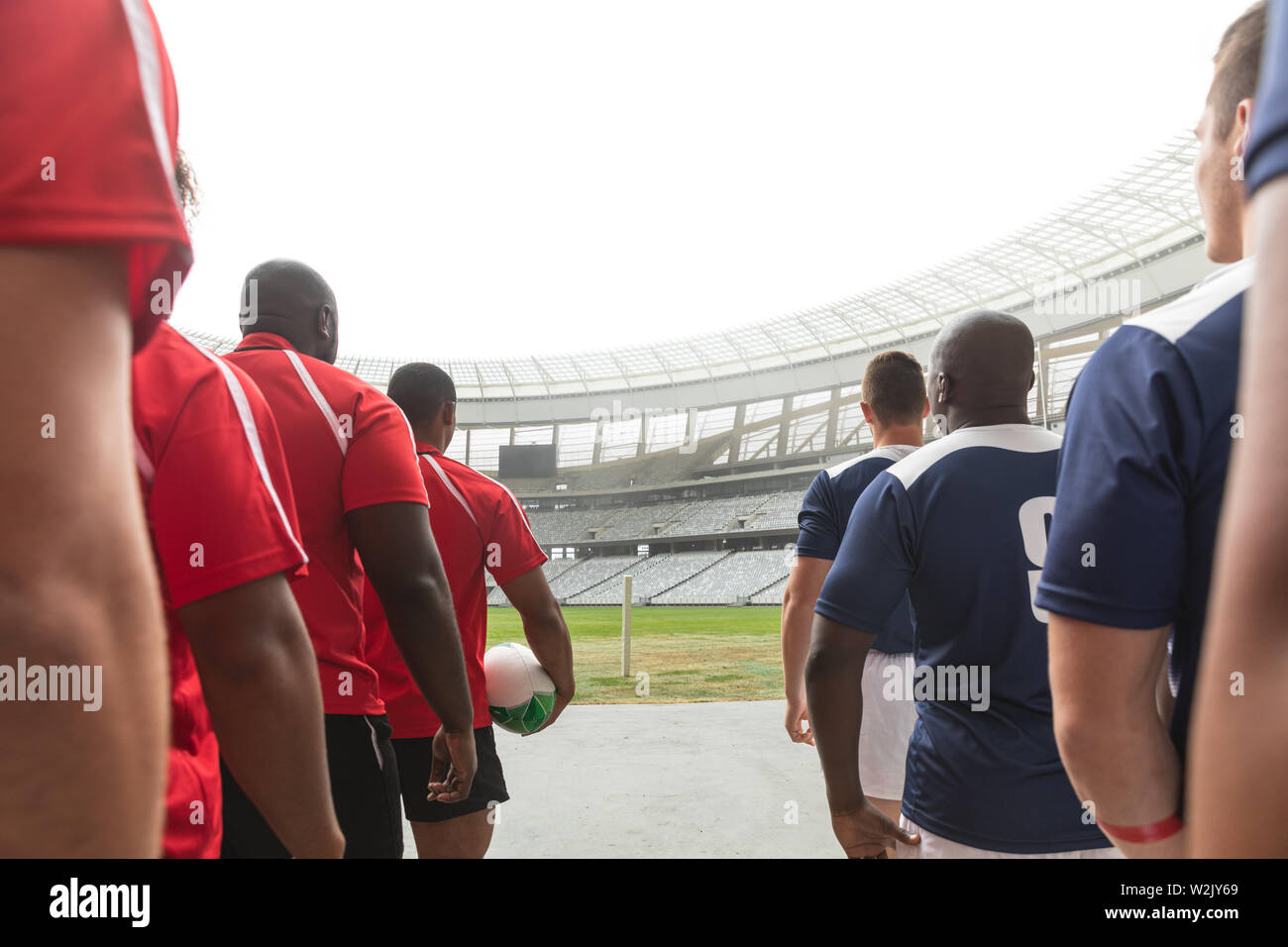 Rugby teams standing in a row at the entrance of stadium for match ...