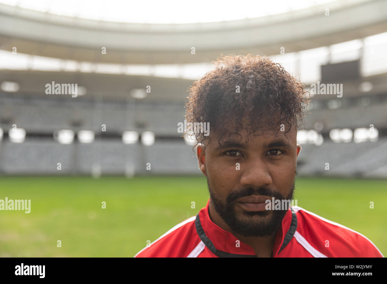 Rugby player looking at camera in the stadium Stock Photo - Alamy