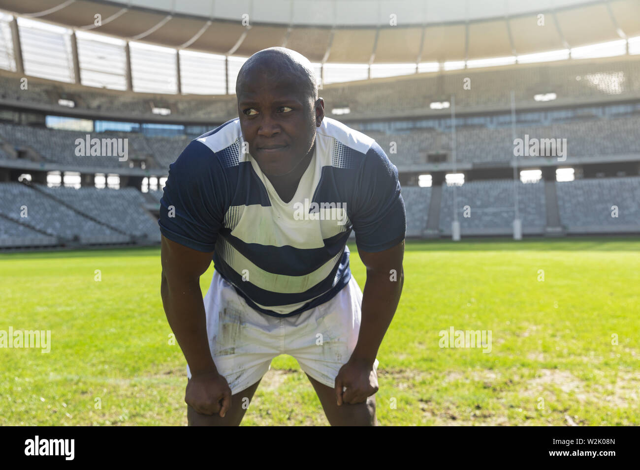 Male rugby player standing in stadium Stock Photo - Alamy