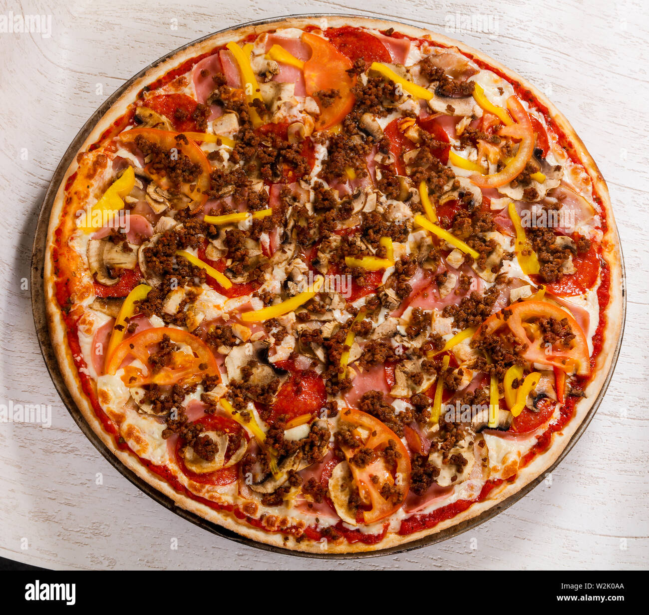 Pizza with minced meat and vegetables Stock Photo - Alamy