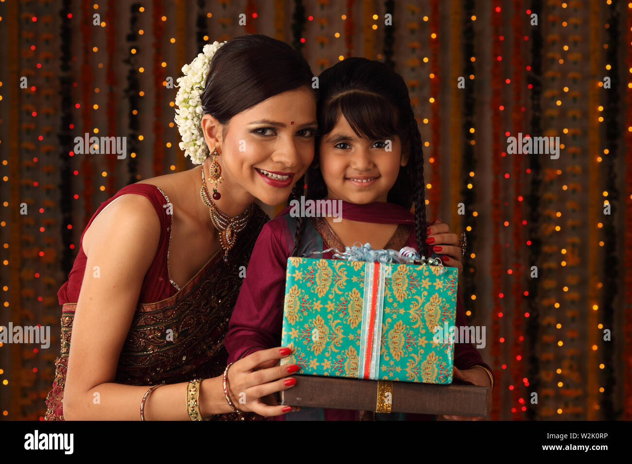 Portrait of an Indian family celebrating diwali Stock Photo - Alamy