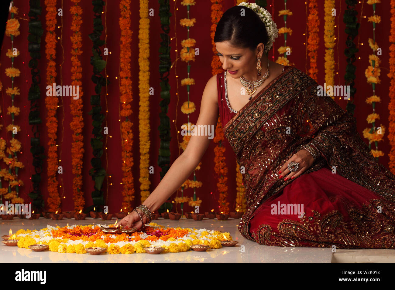 Rangoli woman hi-res stock photography and images - Alamy