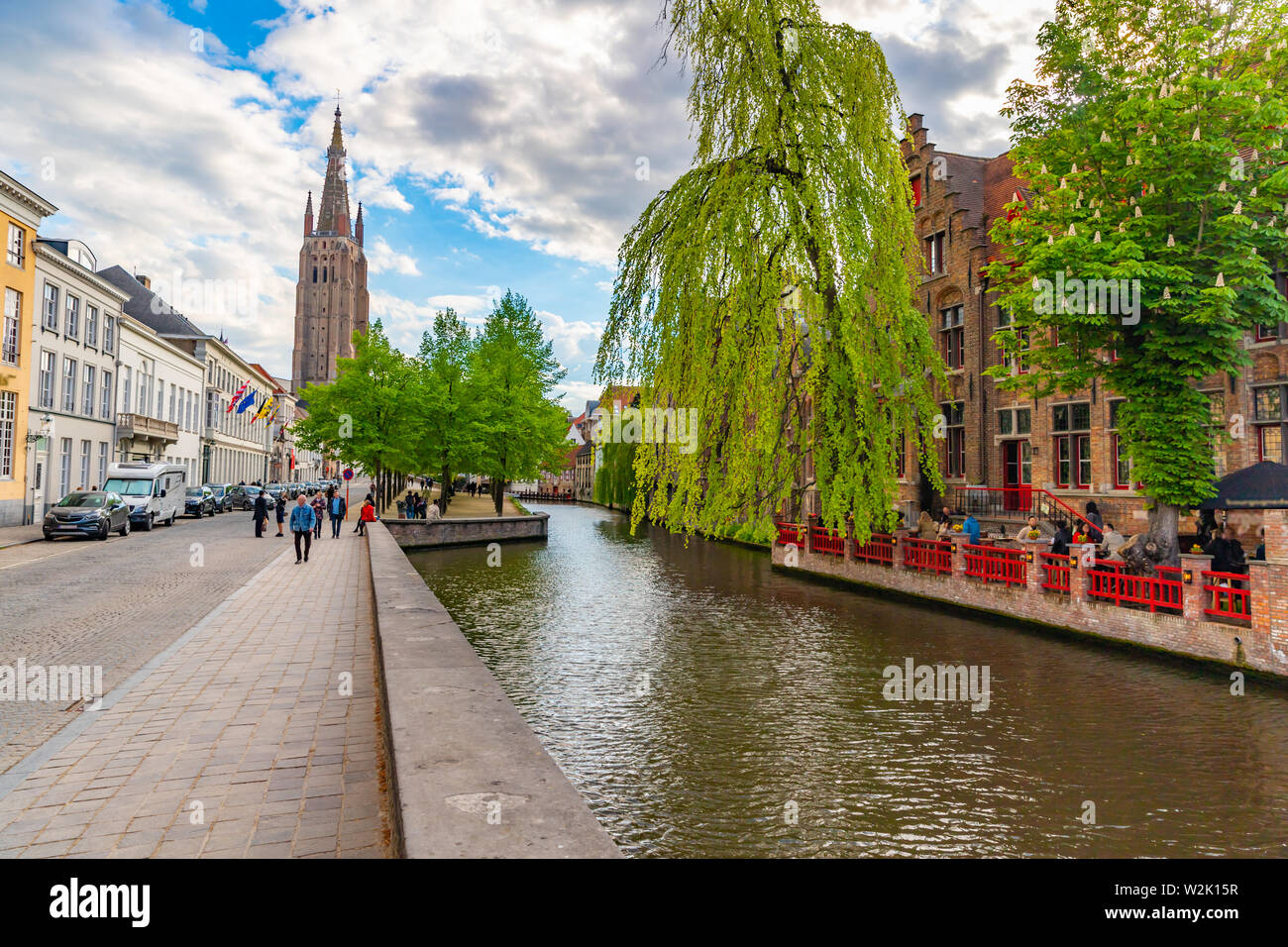 View of Dijver canal with houses and trees in Bruges, Belgium Stock ...