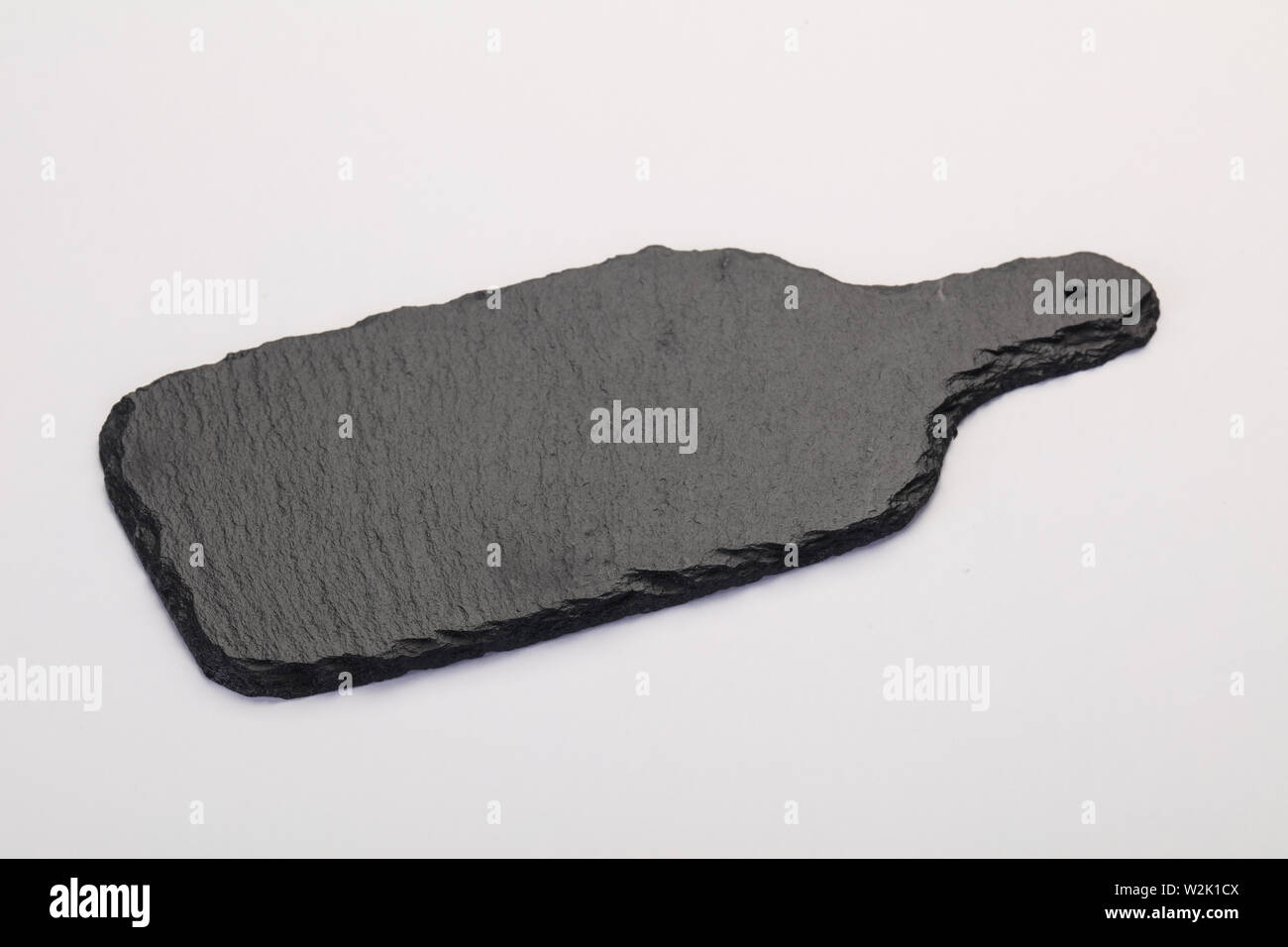 Stone board for serving dishes - kitchenware Stock Photo - Alamy